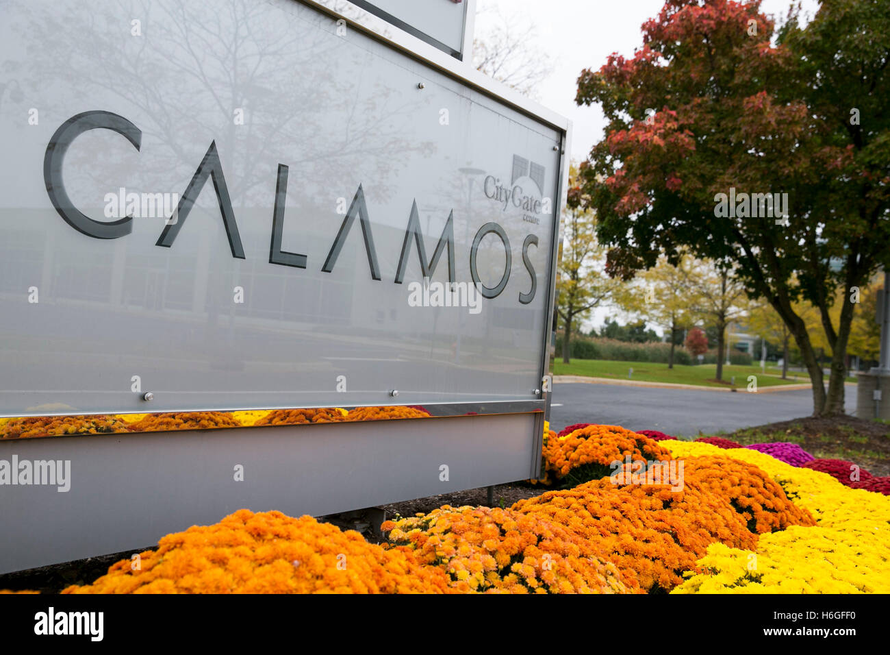 A logo sign outside of the headquarters of Calamos Asset Management in ...