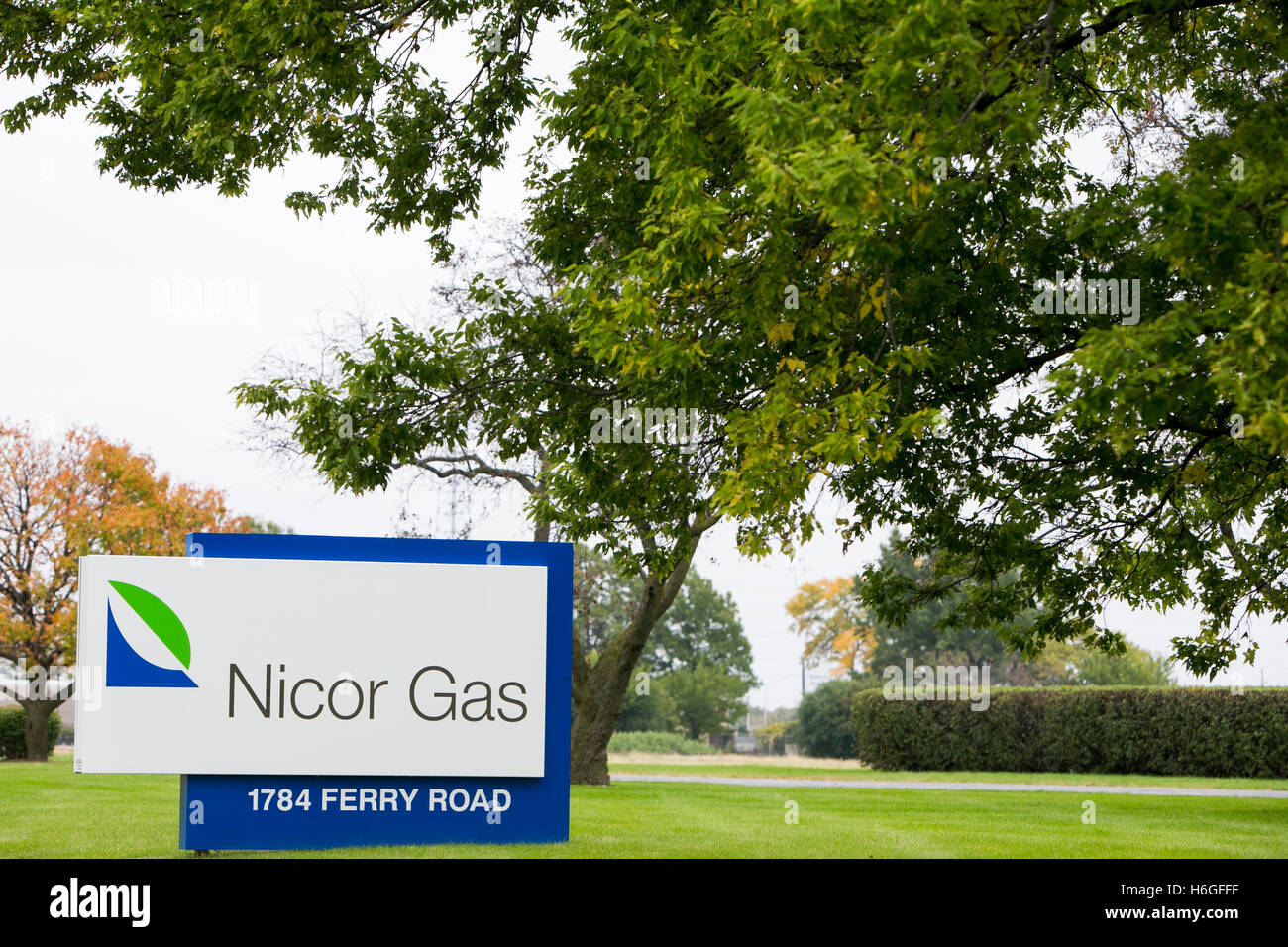 A logo sign outside of the headquarters of Nicor Gas in Naperville ...