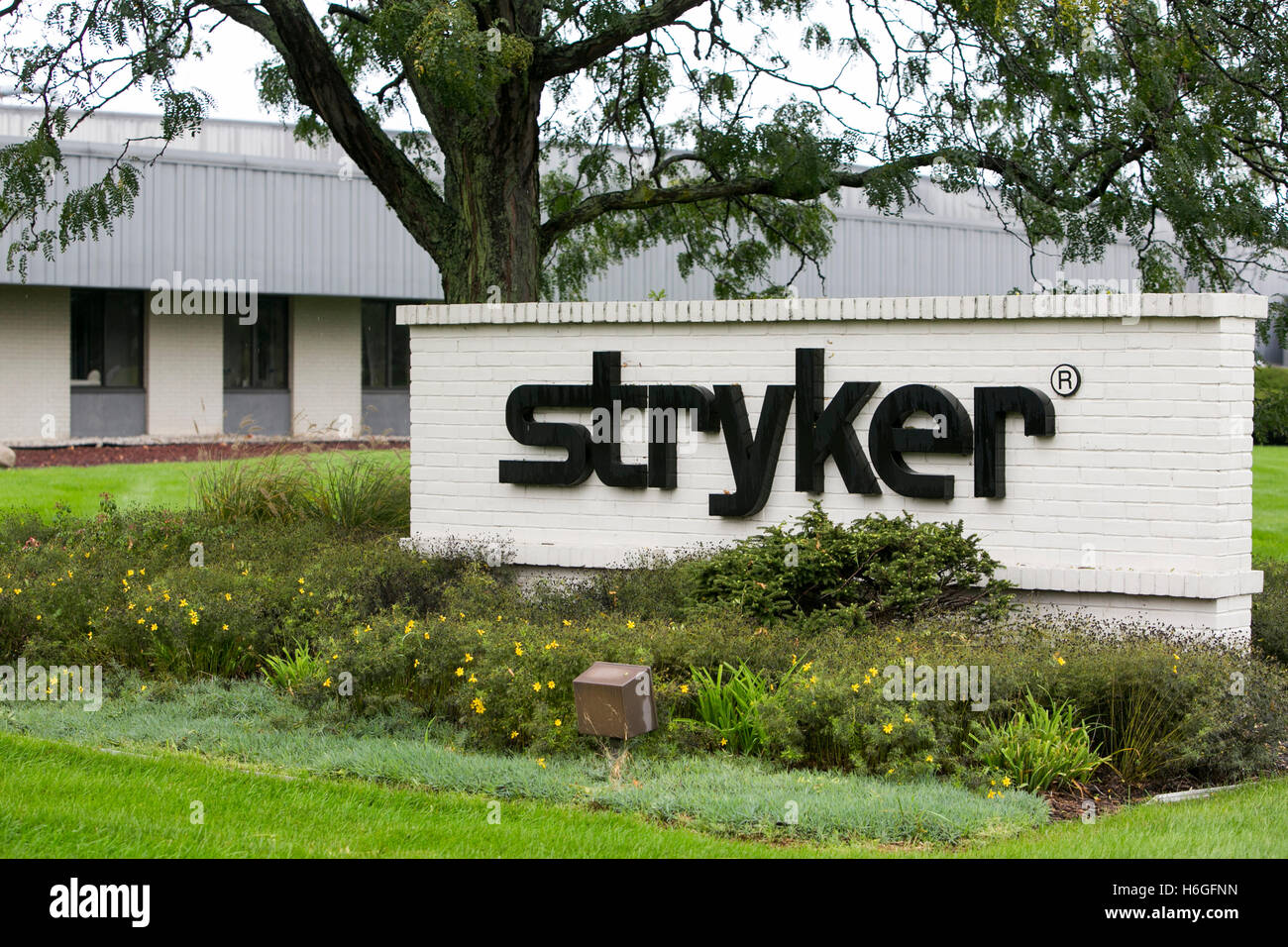 A logo sign outside of a facility occupied by the Stryker Corporation ...