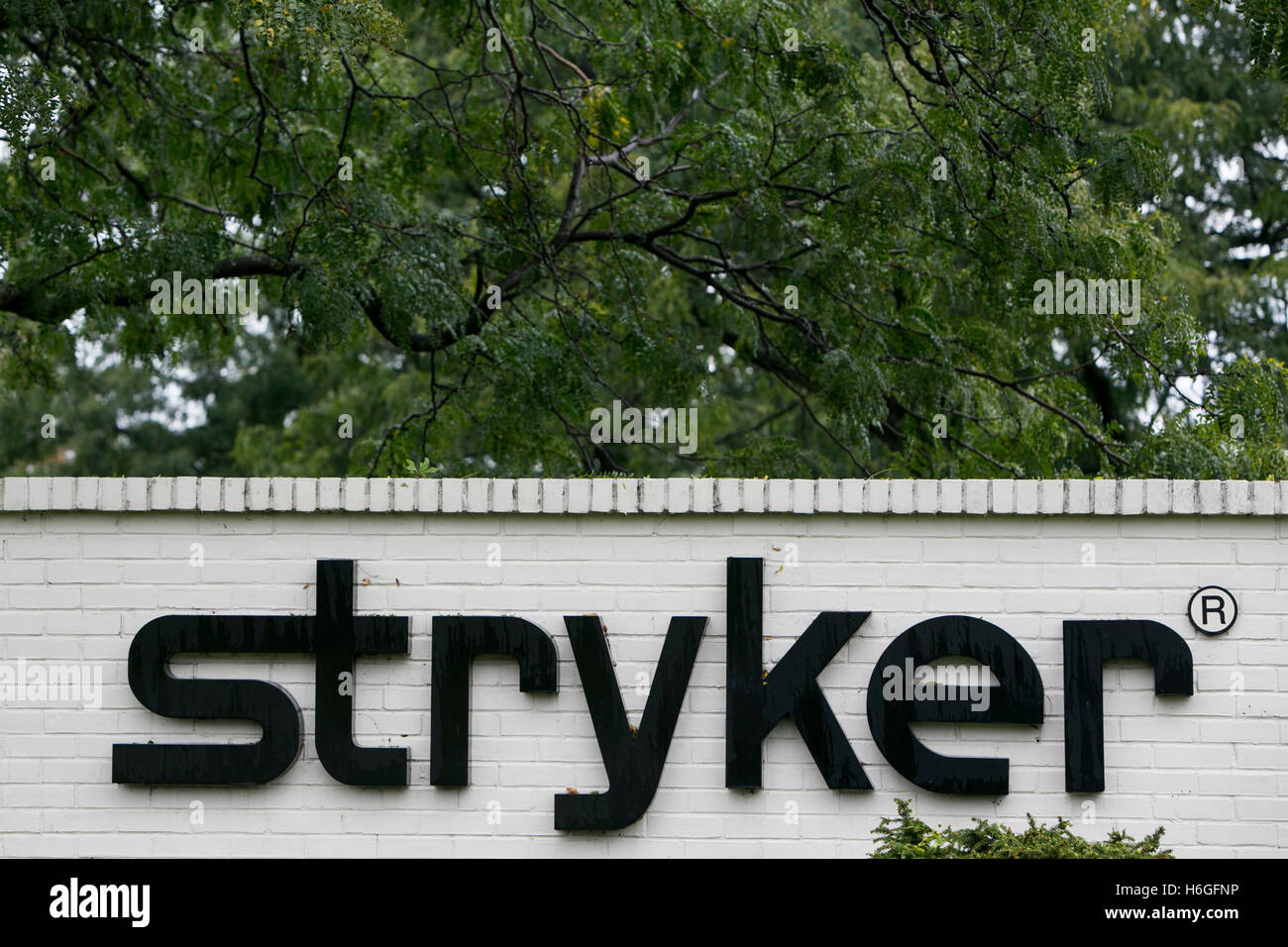 A logo sign outside of a facility occupied by the Stryker Corporation ...