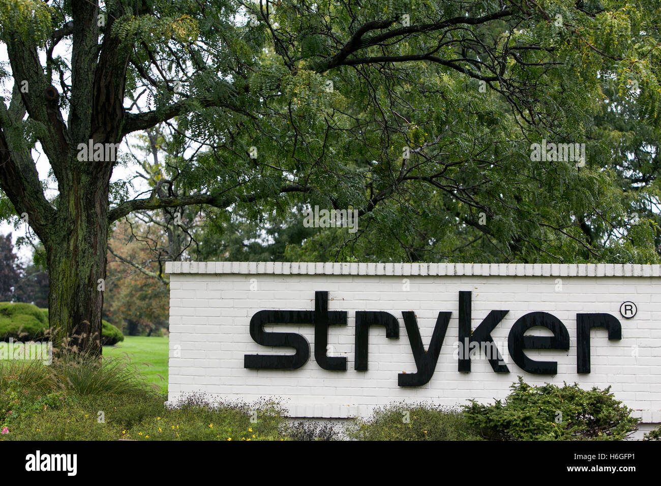 A logo sign outside of a facility occupied by the Stryker Corporation ...