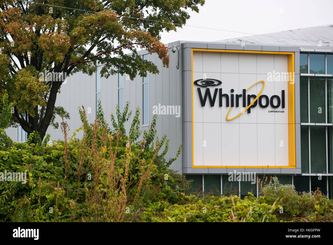 A logo sign outside of a facility occupied by The Whirlpool Corporation ...