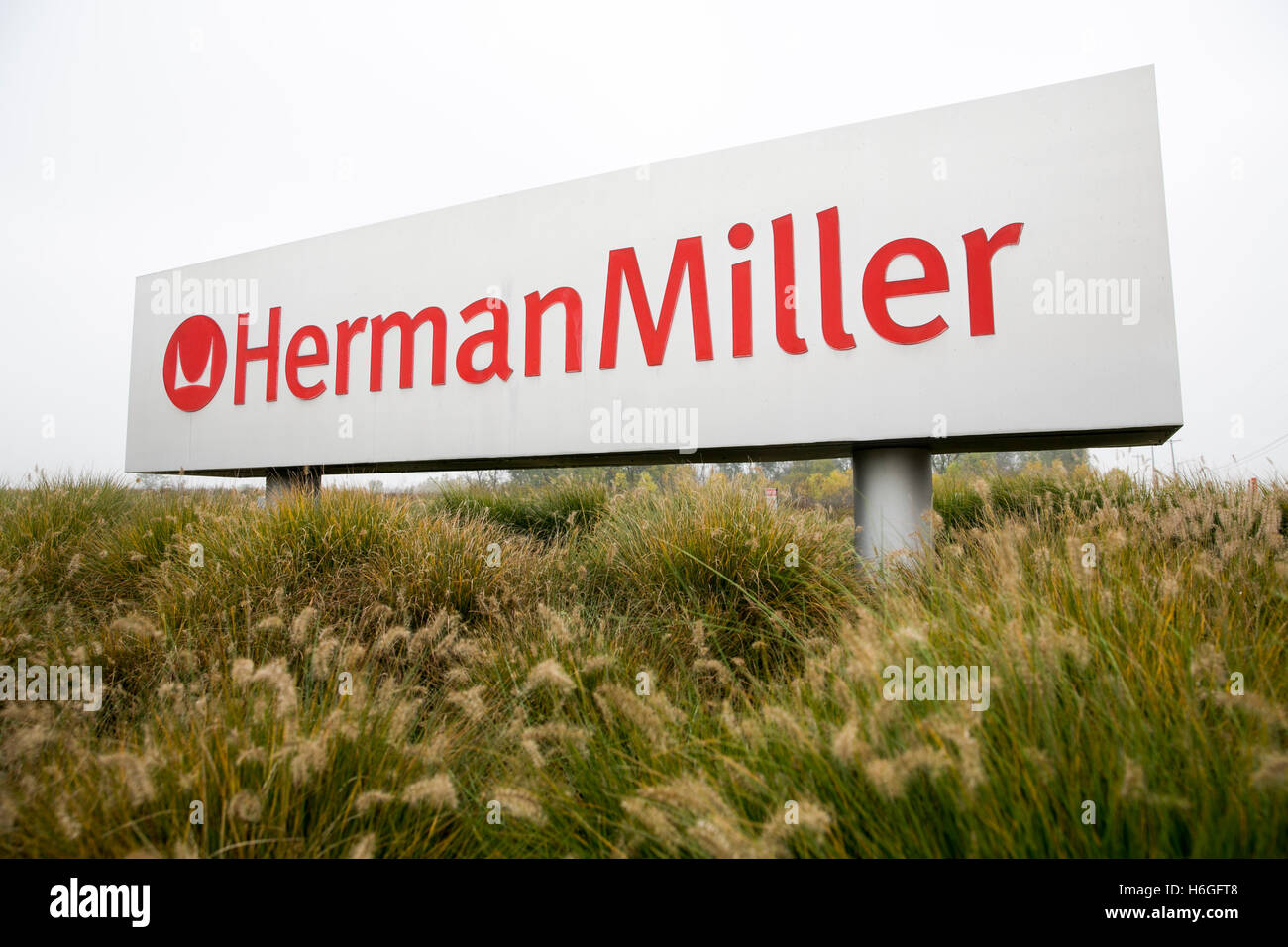 A logo sign outside of a facility occupied by Herman Miller, Inc., in ...