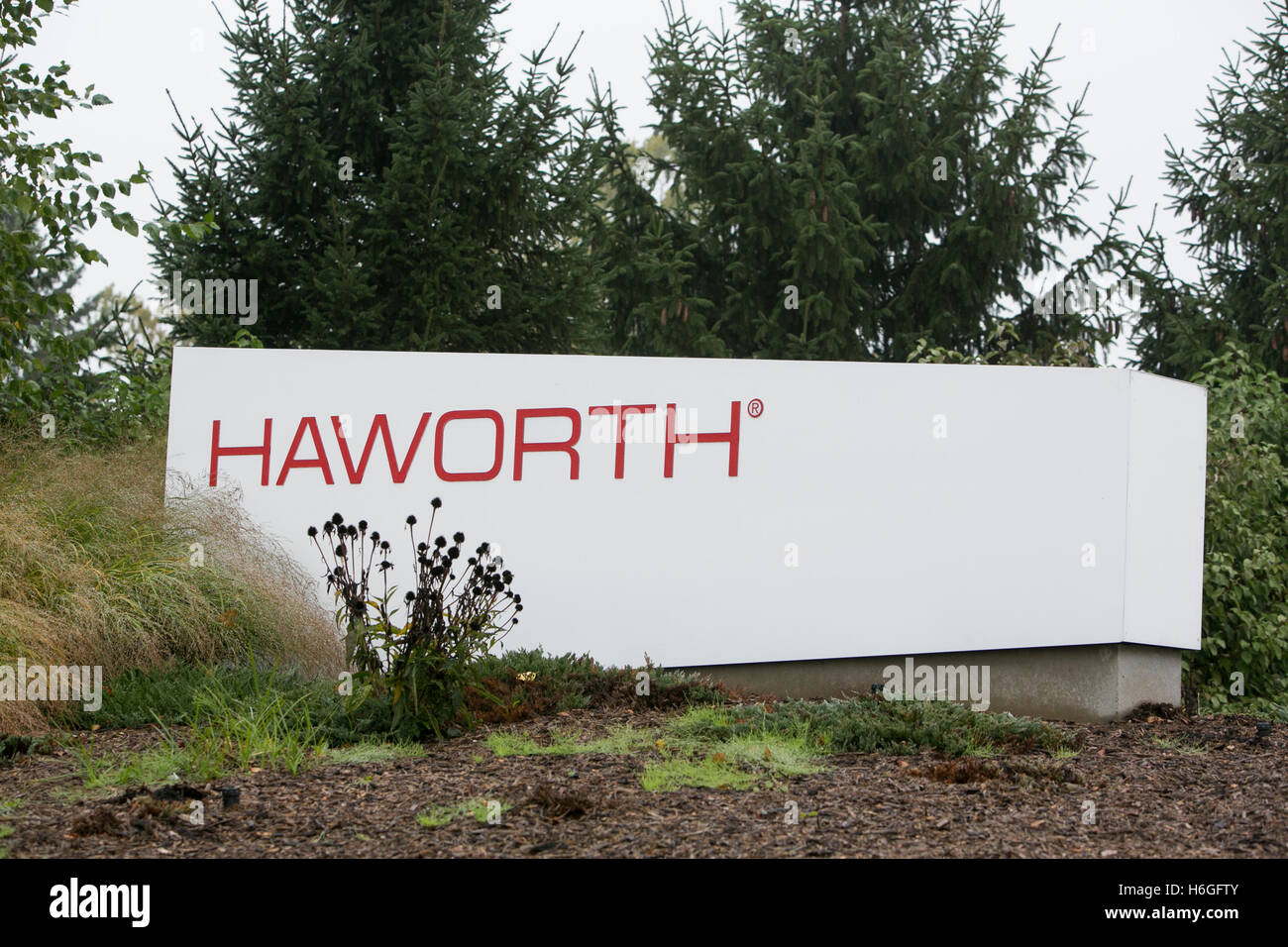 A logo sign outside of the headquarters of Haworth Inc., in Holland ...