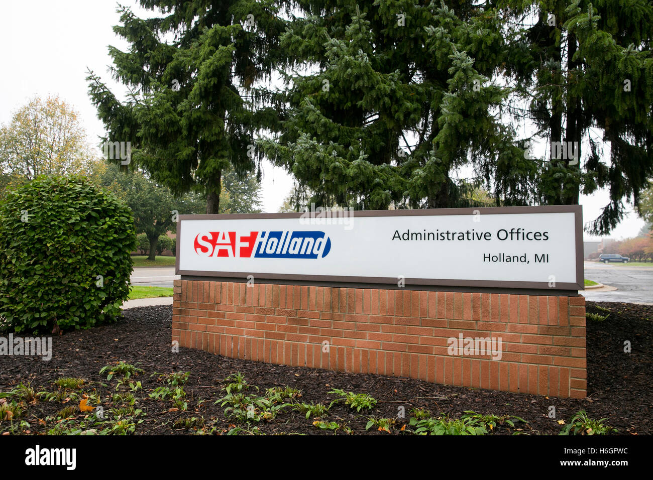 A logo sign outside of the headquarters of SAF-HOLLAND in Holland ...