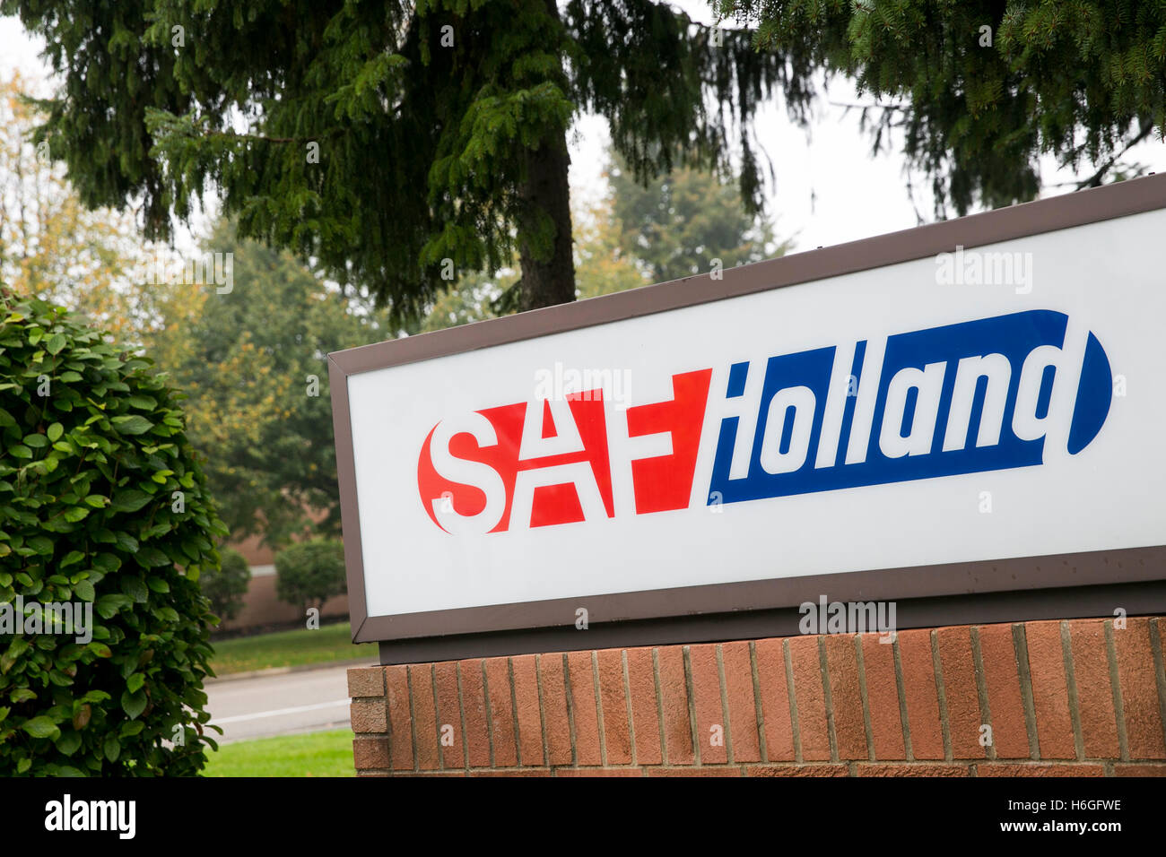 A logo sign outside of the headquarters of SAF-HOLLAND in Holland ...