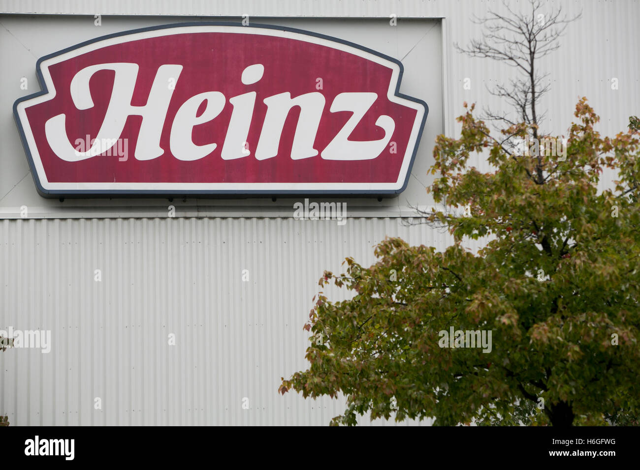 A logo sign outside of a facility occupied by Heinz in Holland ...