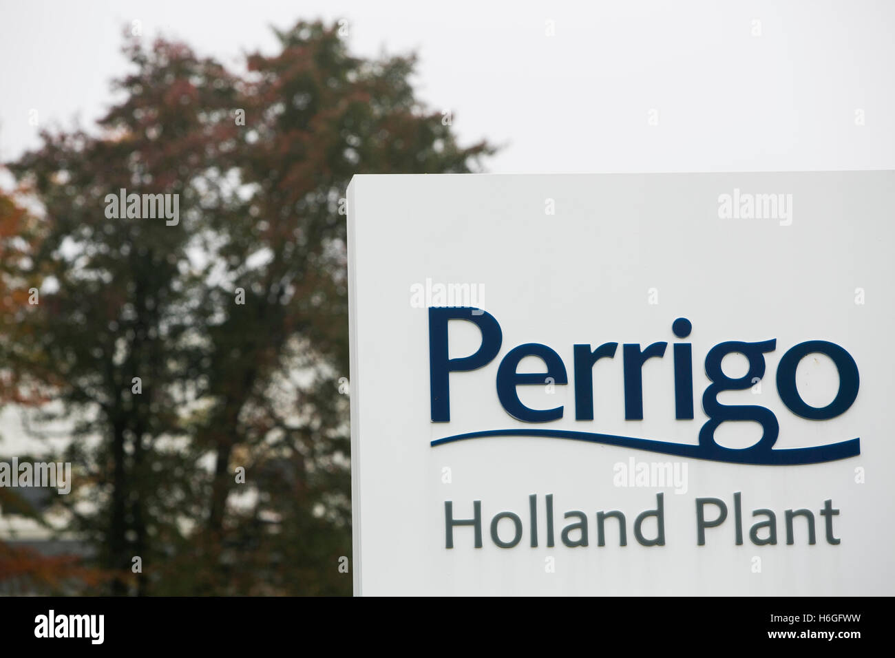 A logo sign outside of a facility occupied by the Perrigo Company in ...