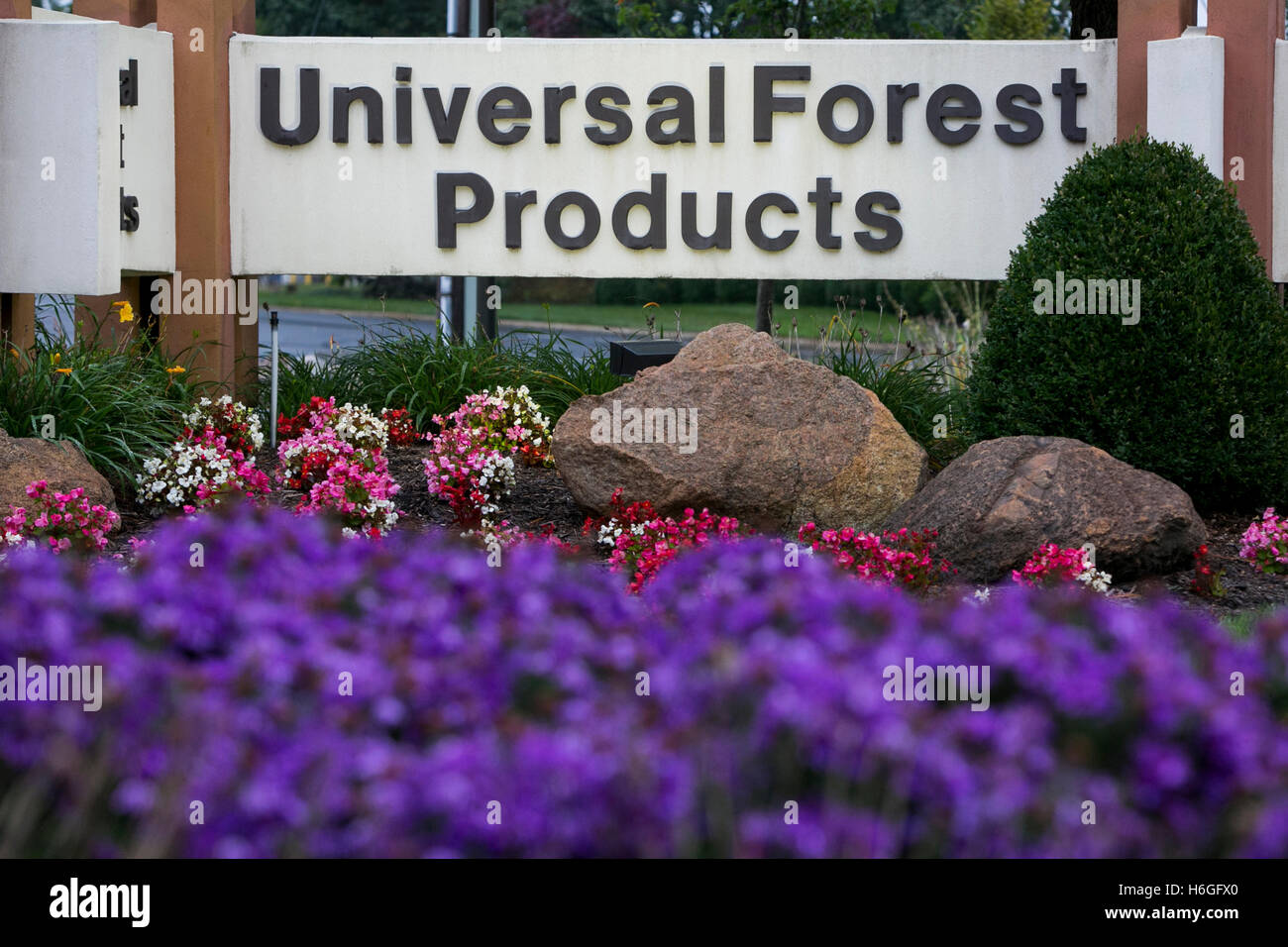 A logo sign outside of the headquarters of Universal Forest Products in ...