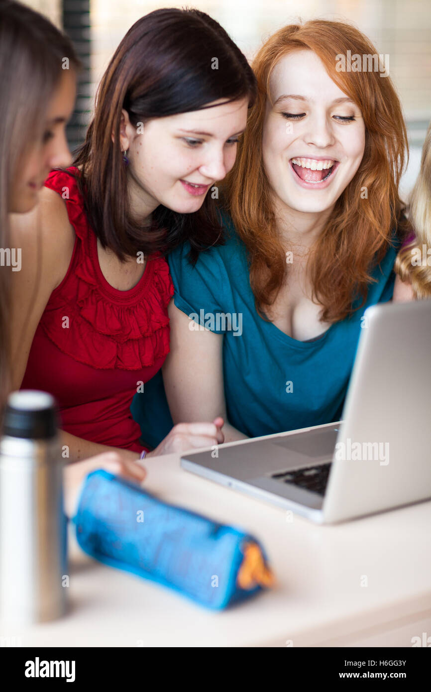 Students in a classroom during class (color toned image; shallow DOF ...