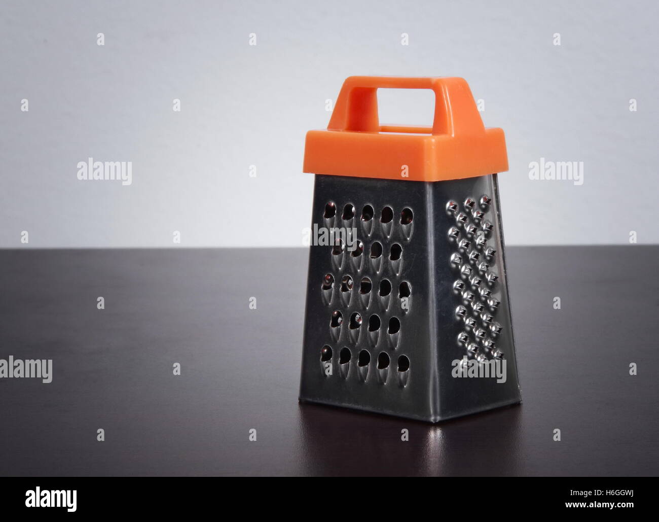 Stainless steel grater orange hi-res stock photography and images - Alamy
