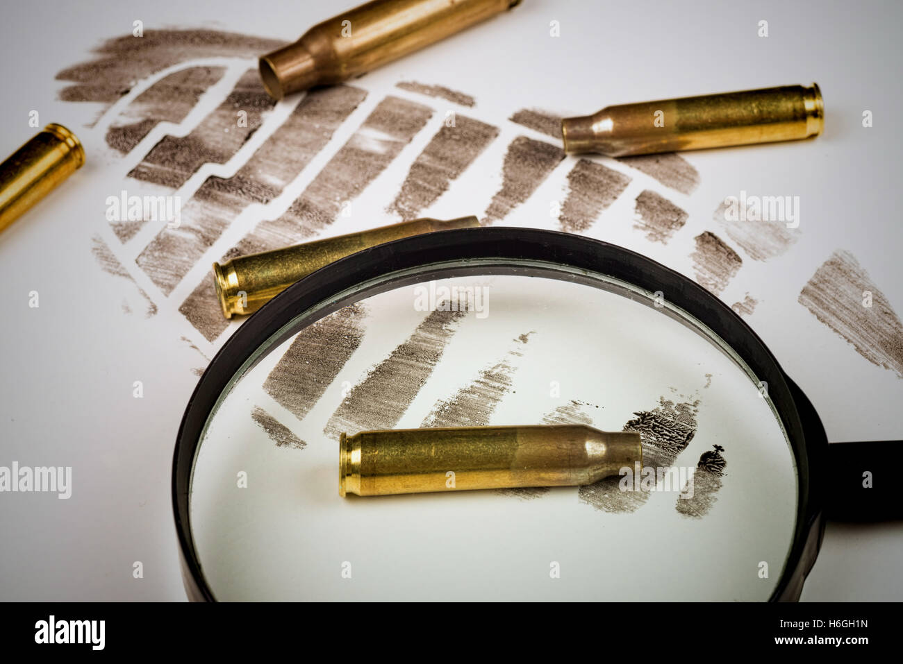 Footprint and bullet shells on a crime scene, a concept Stock Photo - Alamy