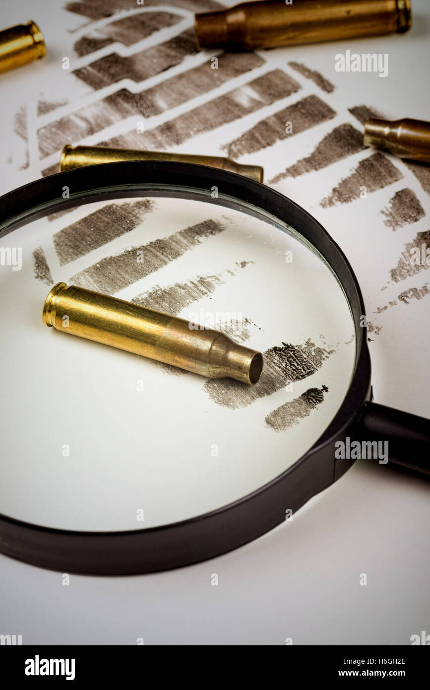 Footprint and bullet shells on a crime scene, a concept Stock Photo - Alamy
