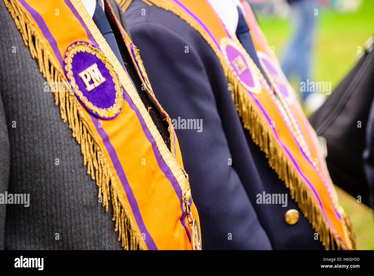 Two Past Masters of the Orange Lodge stand while wearing their sashes ...