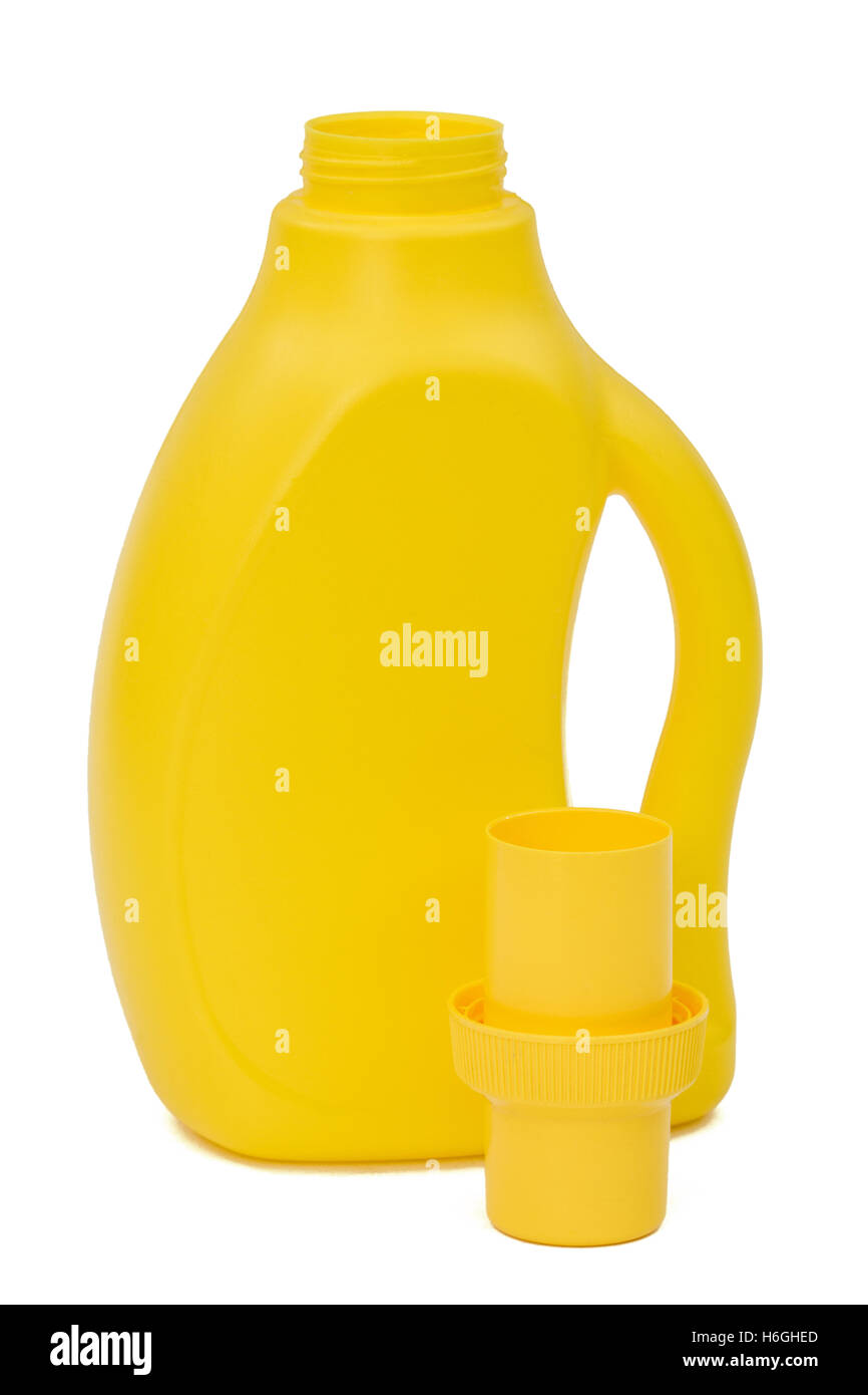 Yellow plastic bottle with a dispenser in cap, isolated on white ...
