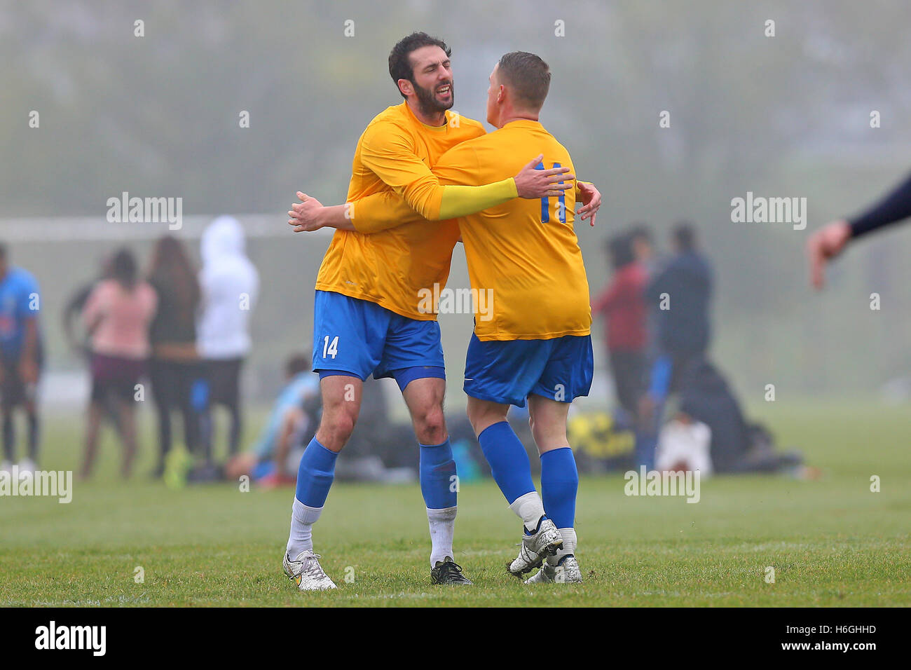 Mile End score their first goal and celebrate during Mile End (yellow ...