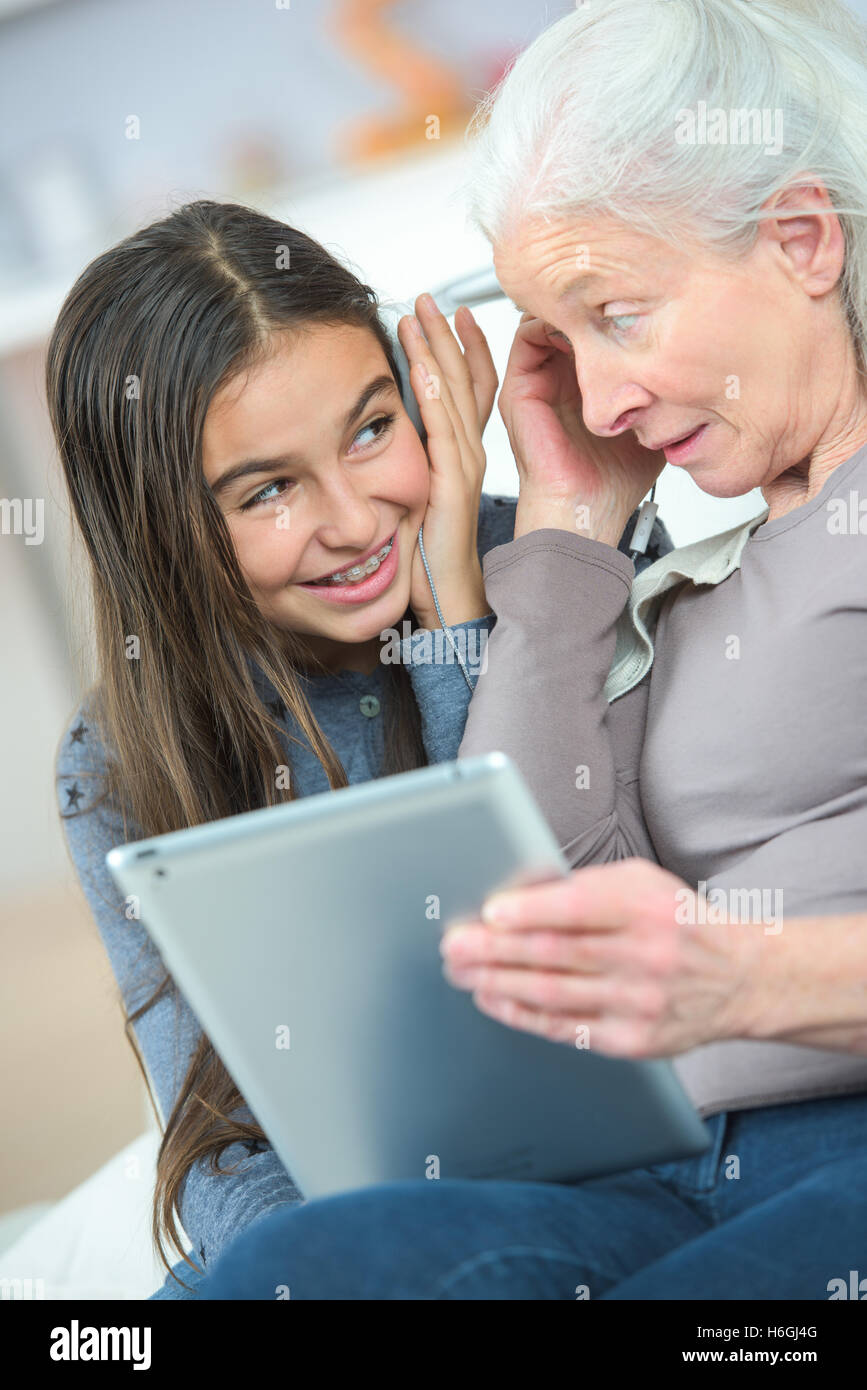 Spending time with grandma Stock Photo - Alamy