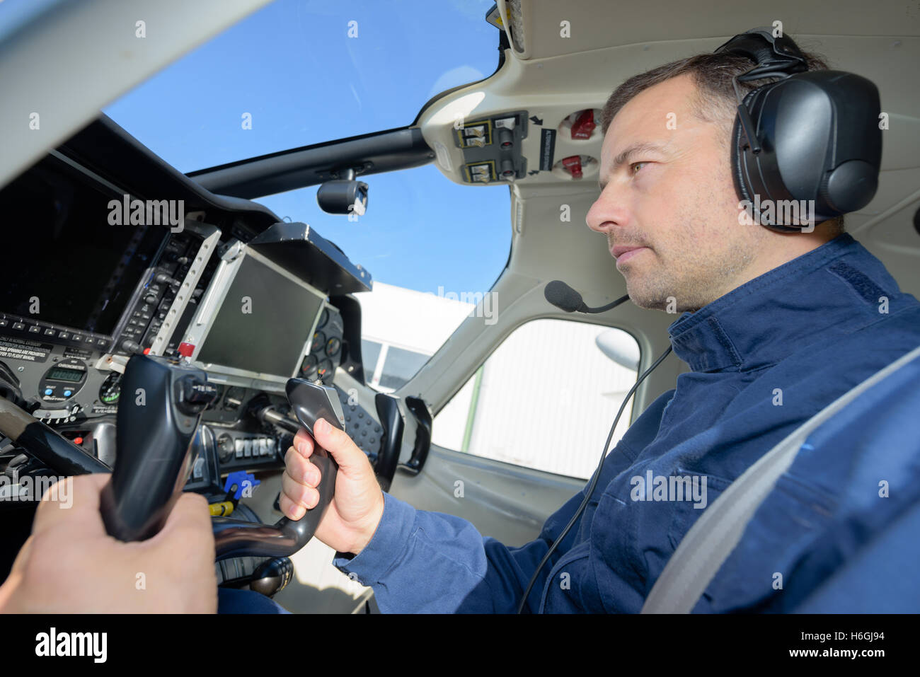 Pilot in aircraft Stock Photo - Alamy