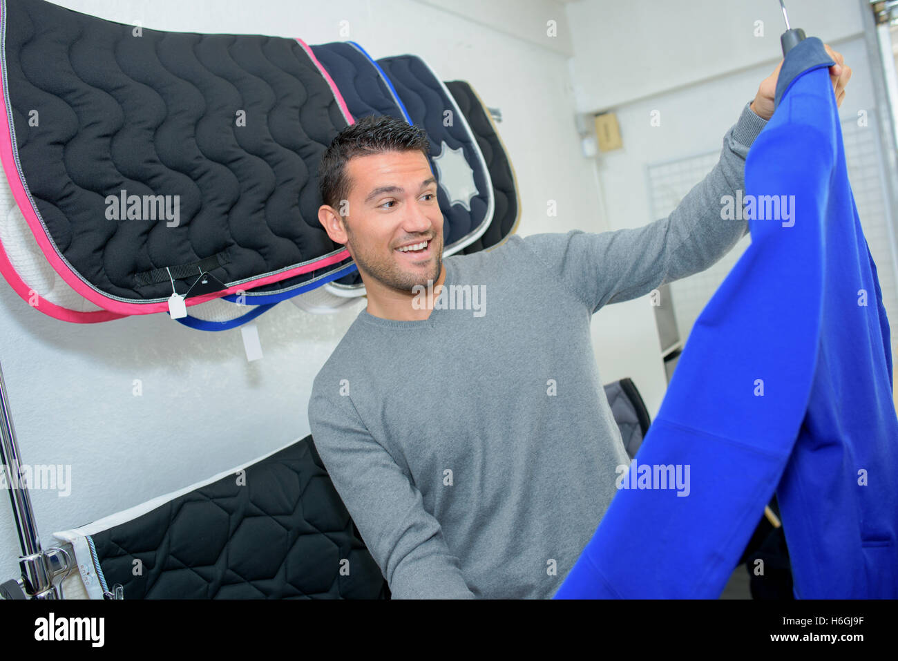 man in riding store Stock Photo - Alamy