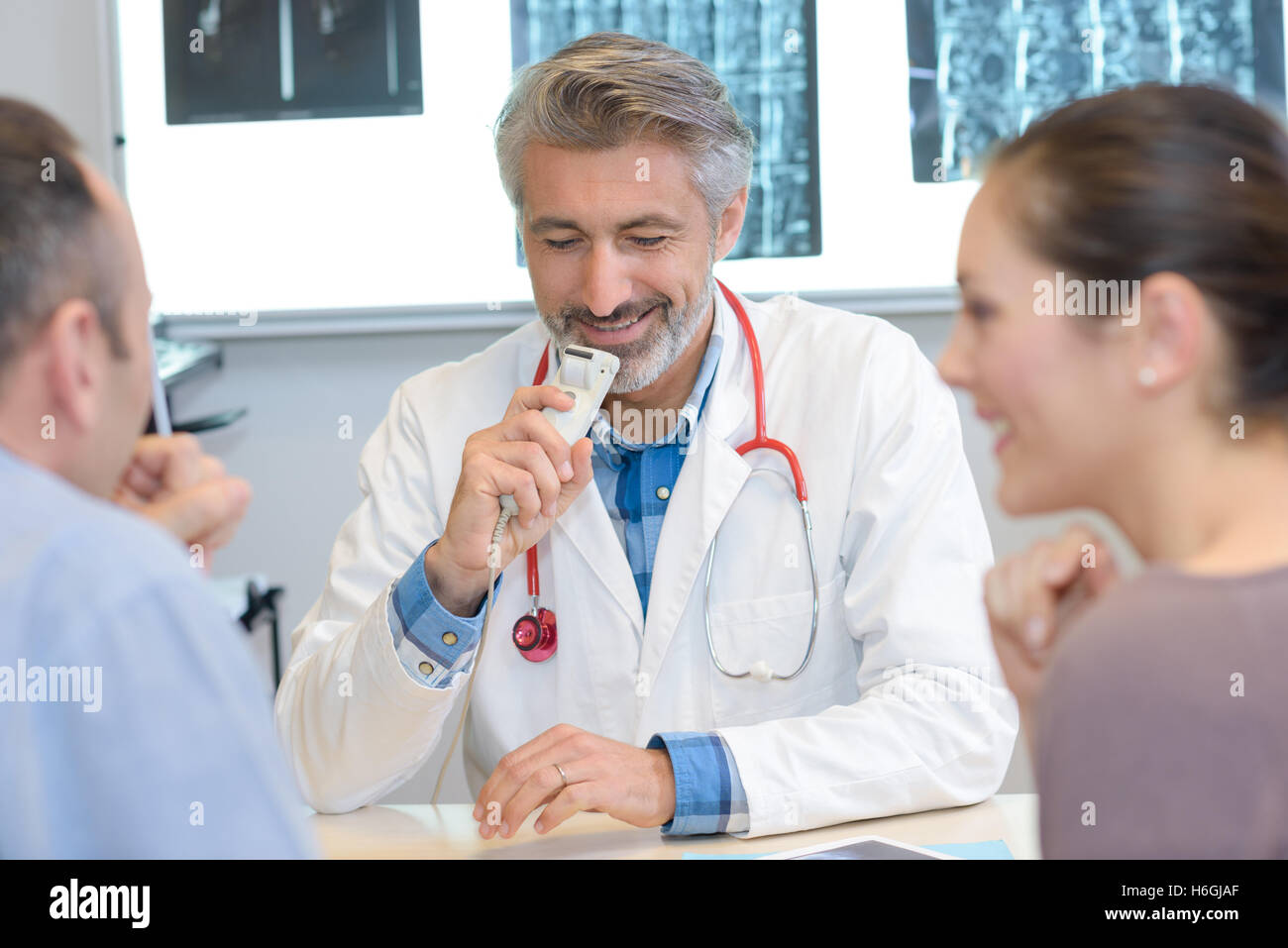Doctor laughing hi-res stock photography and images - Alamy
