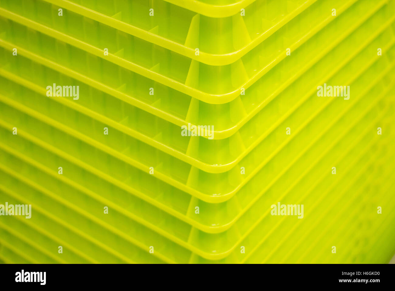 Stack of green plastic boxes background texture Stock Photo - Alamy