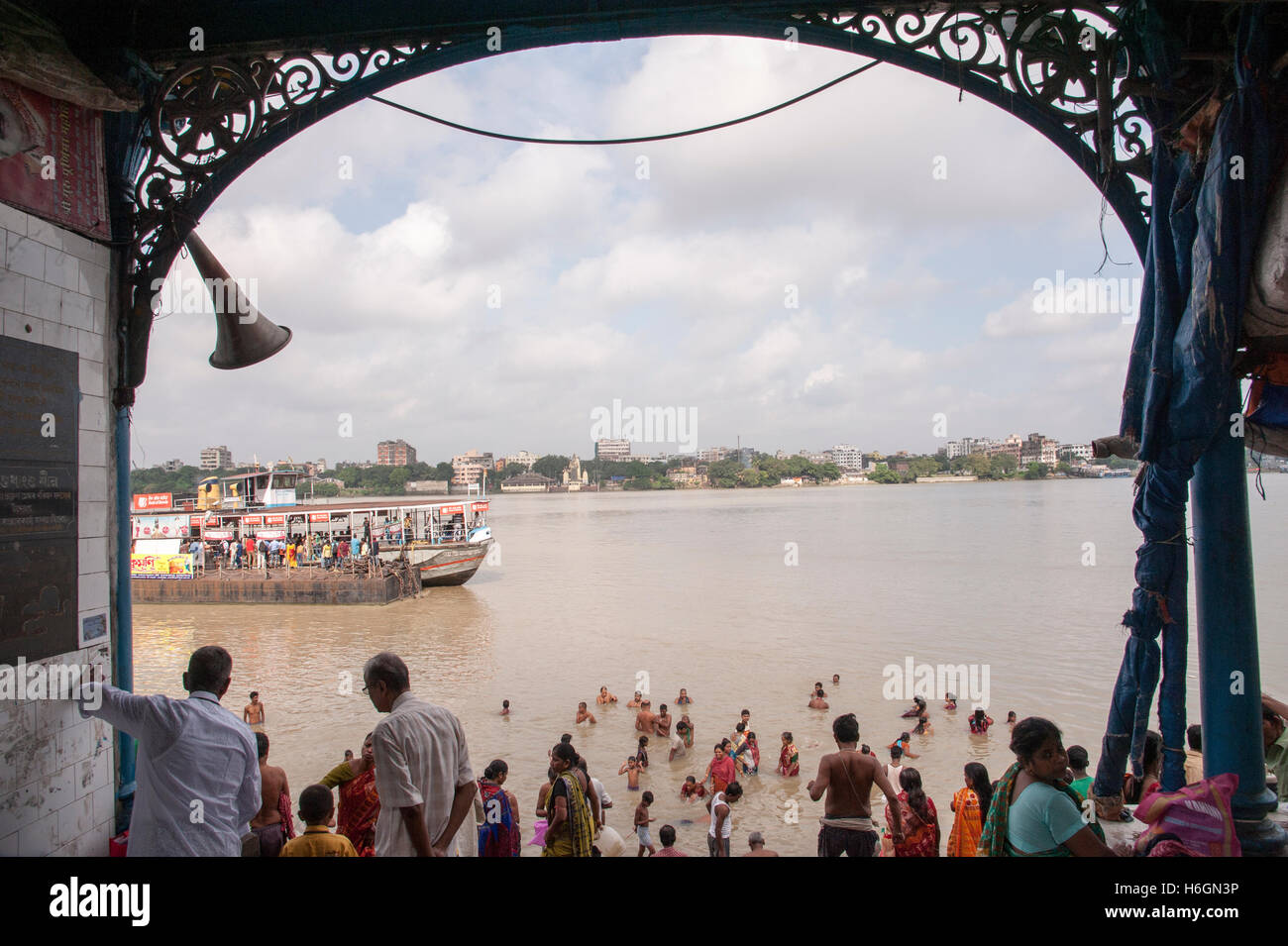 Hindu people bathing on Ahiritola ghat Hooghly River Kolkata West ...