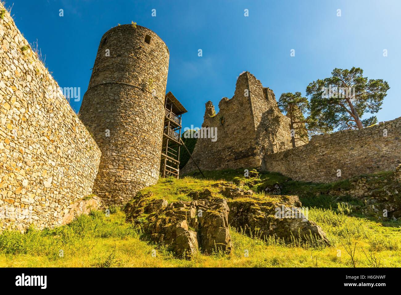 Horizontal photo of old ruined medieval castle and tower build from ...
