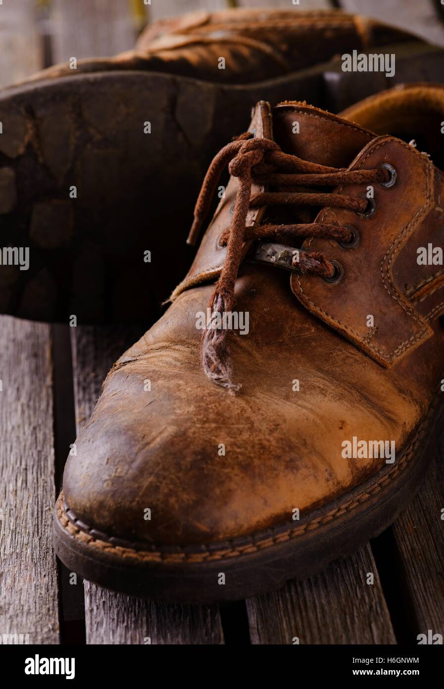 Worn Out Brown Leather Boots Stock Photos & Worn Out Brown Leather ...