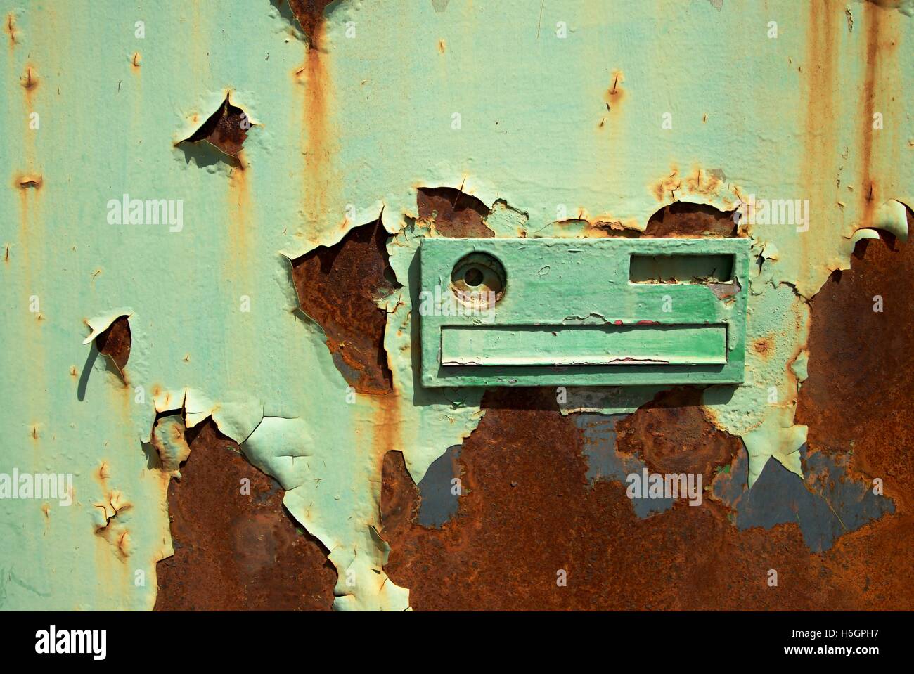 Horizontal photo of old metal gate with very old worn green color. Big ...