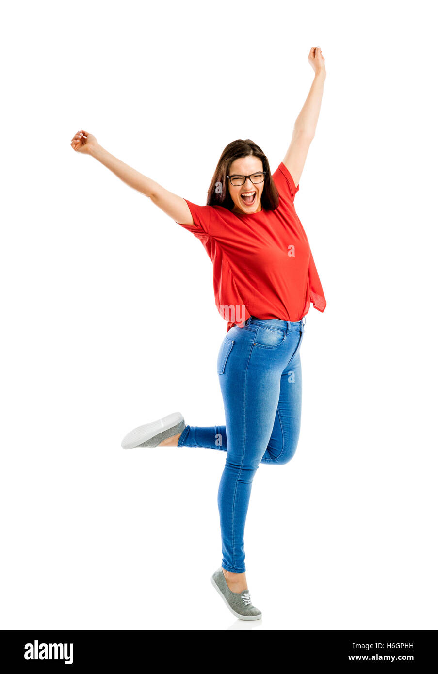 Lovely happy woman jumping of joy Stock Photo - Alamy