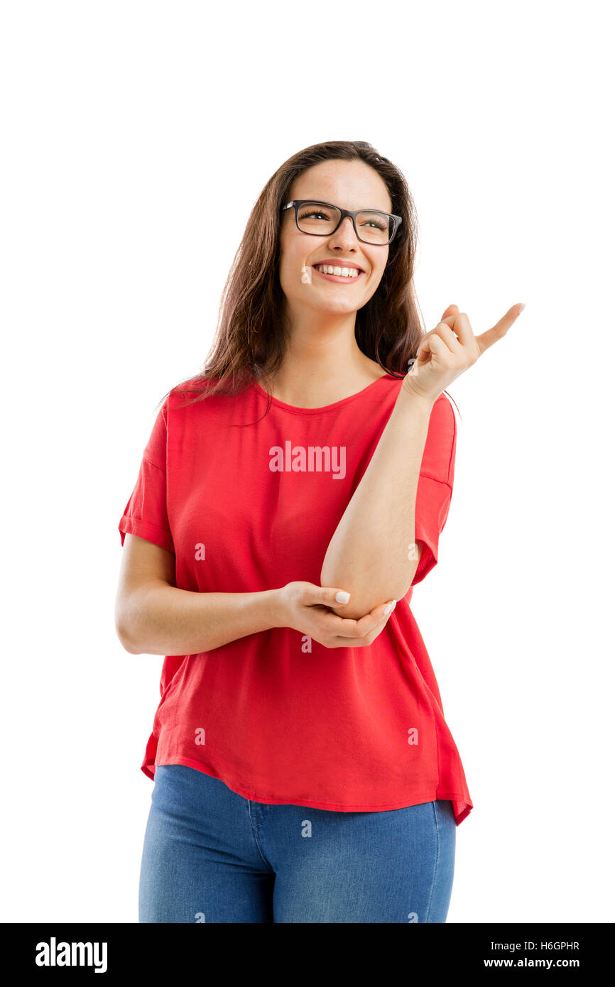 Lovely woman with arms folded and thinking on something Stock Photo - Alamy