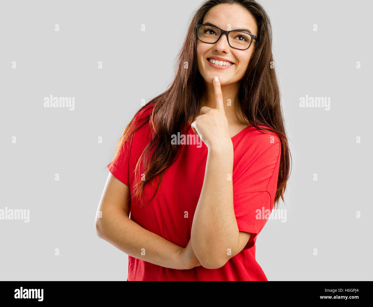 Beautiful and lovely woman making a thinking expression Stock Photo - Alamy