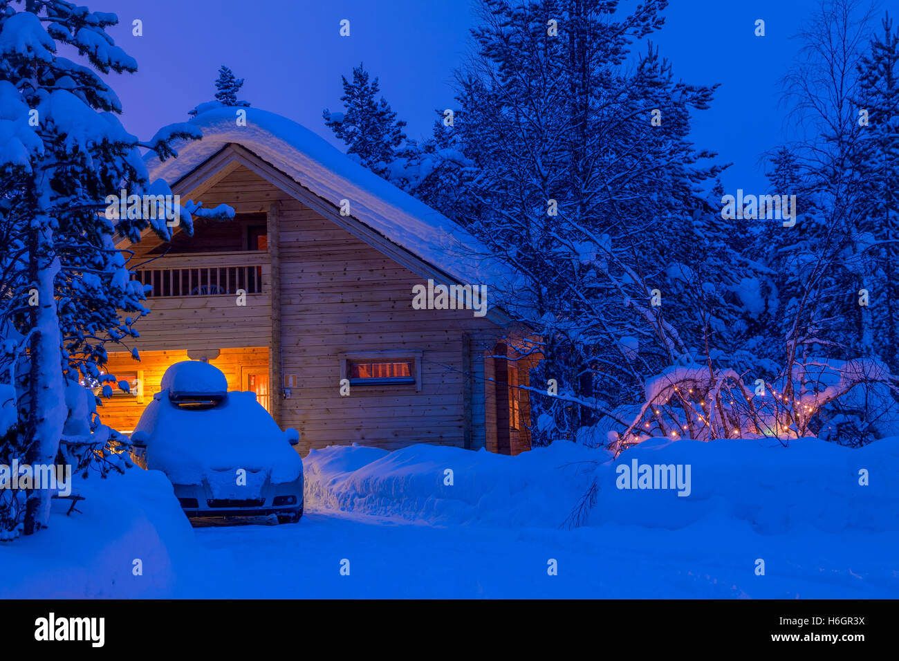 Snowy House At Night