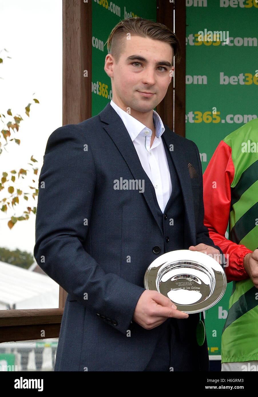 Jockey Joe Colliver receives his award for top conditional jockey at ...