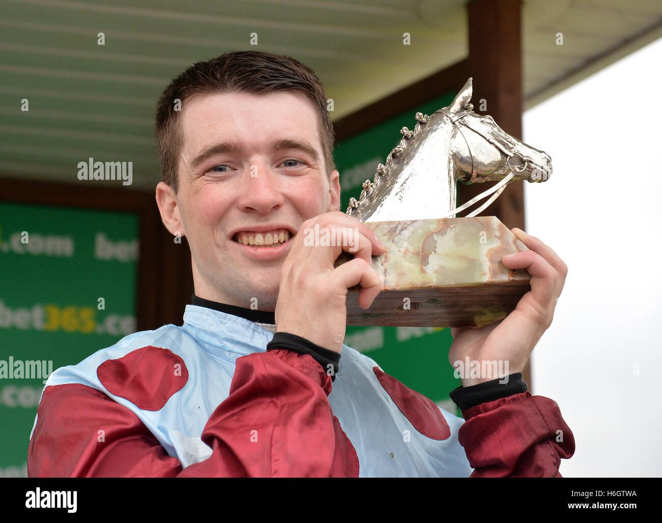 Jockey Jonathan Moore celebrates after riding Irish Cavalier to win the ...