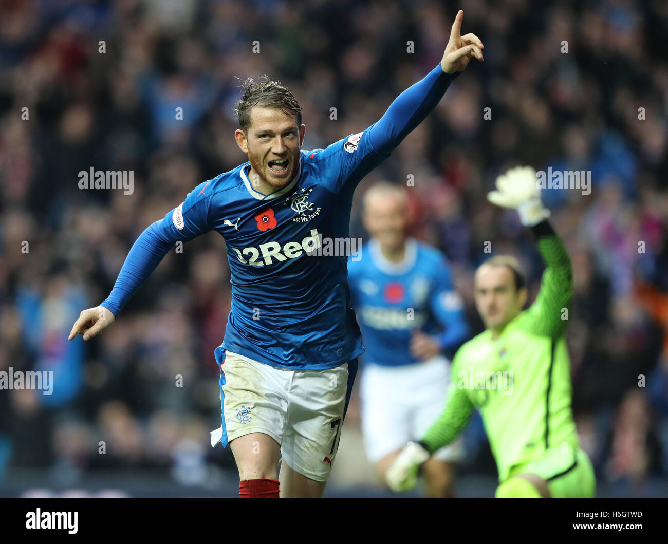 Rangers' Joe Garner celebrates scoring his sides third goal during the ...