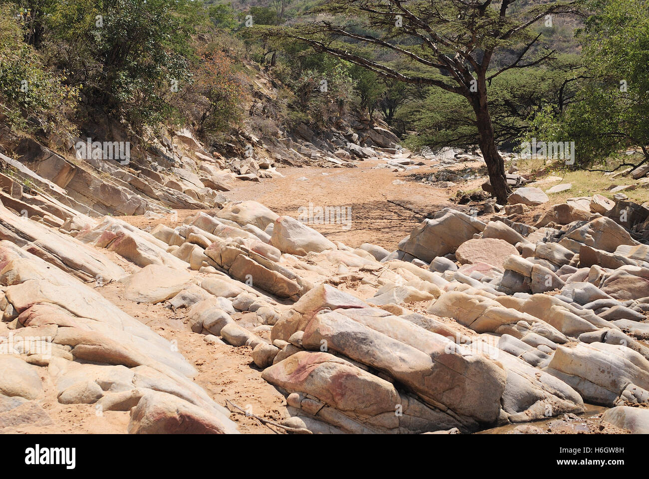Weathered rock formation within an African seasonal dry riverbed Stock ...