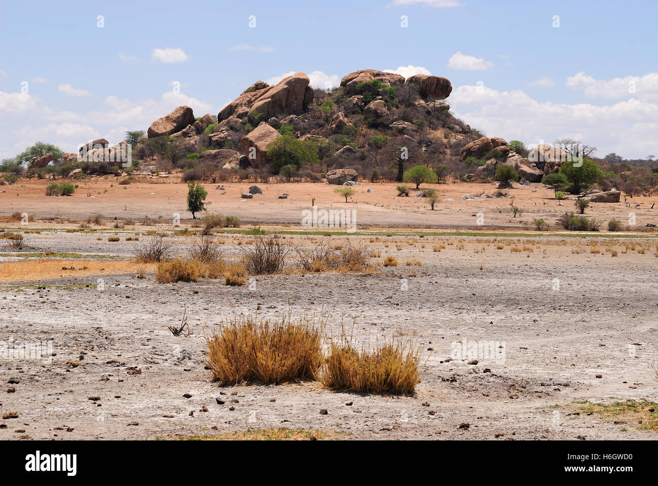 Rock formation around a lake near Nala, Central Tanzania Stock Photo ...