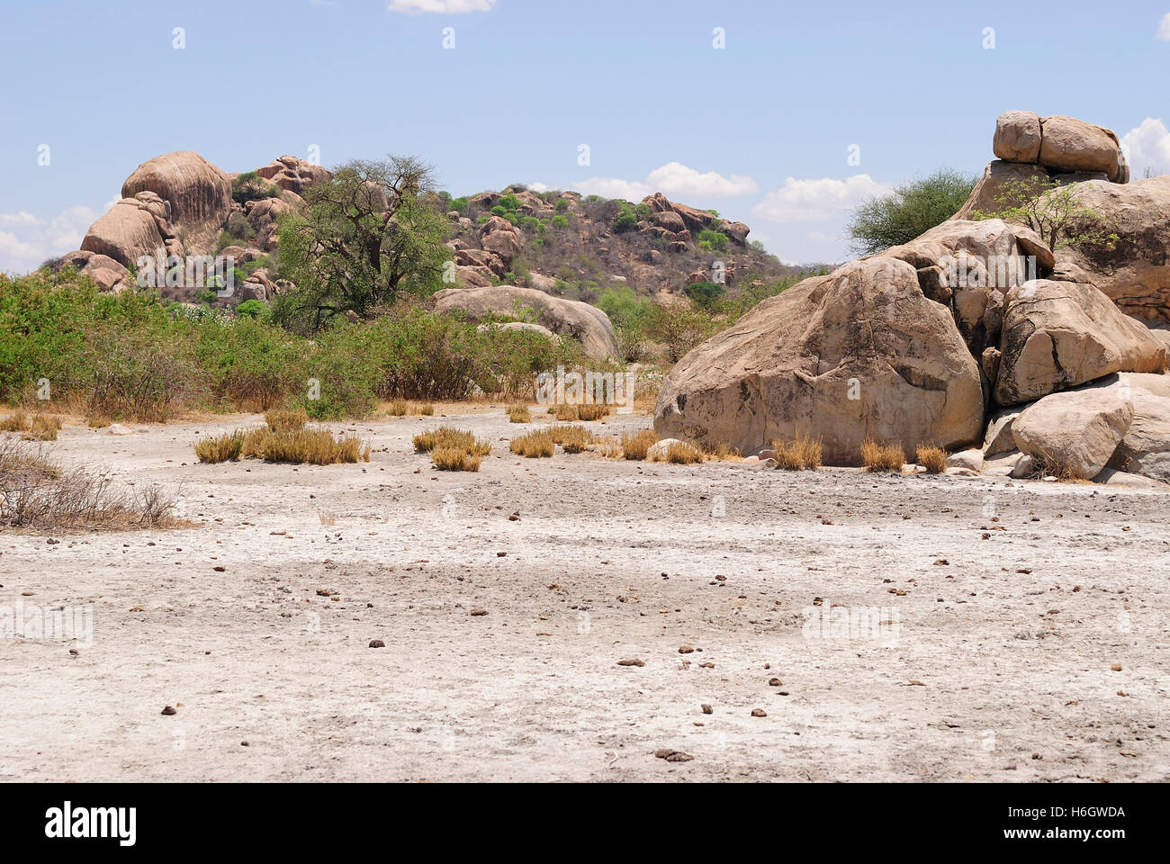 Rock formation around a lake near Nala, Central Tanzania Stock Photo ...