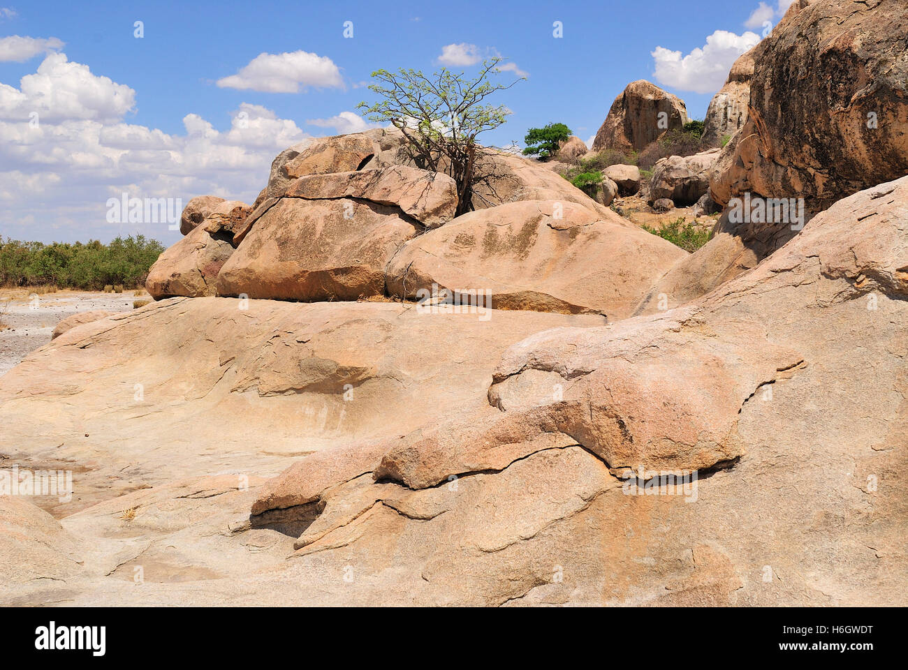 Rock formation around a lake near Nala, Central Tanzania Stock Photo ...