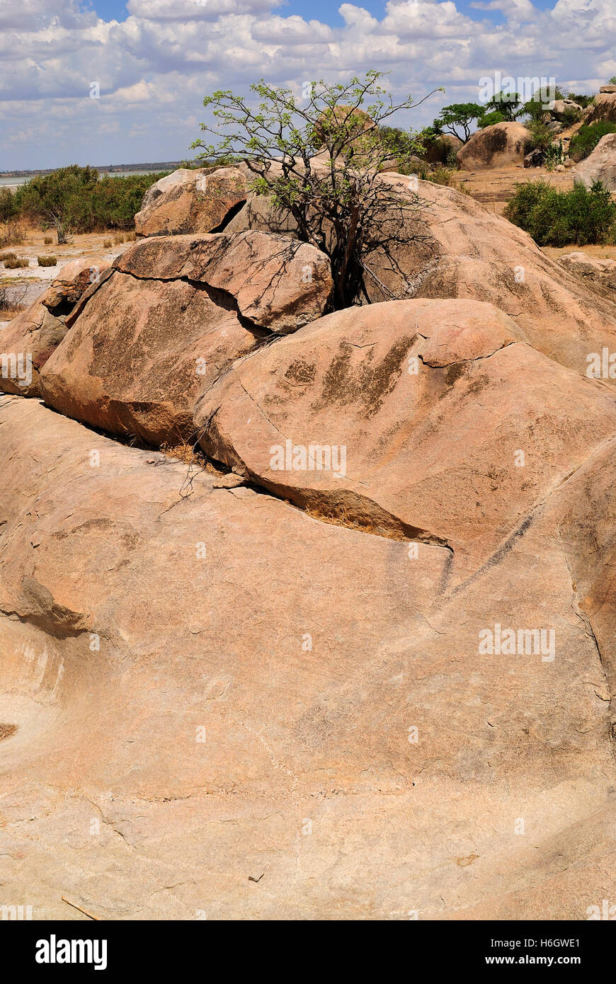Rock formation around a lake near Nala, Central Tanzania Stock Photo ...
