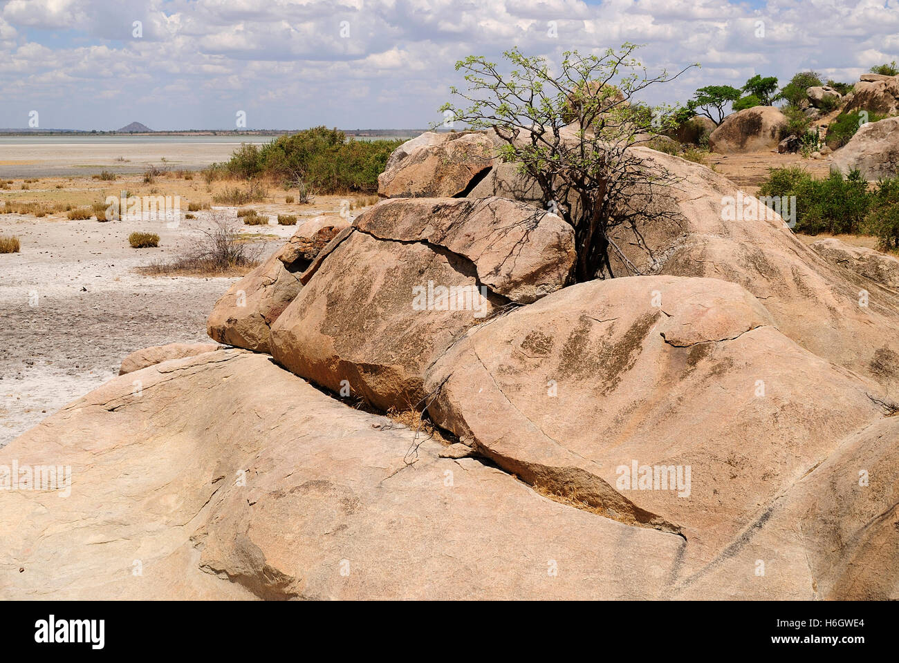 Rock formation around a lake near Nala, Central Tanzania Stock Photo ...