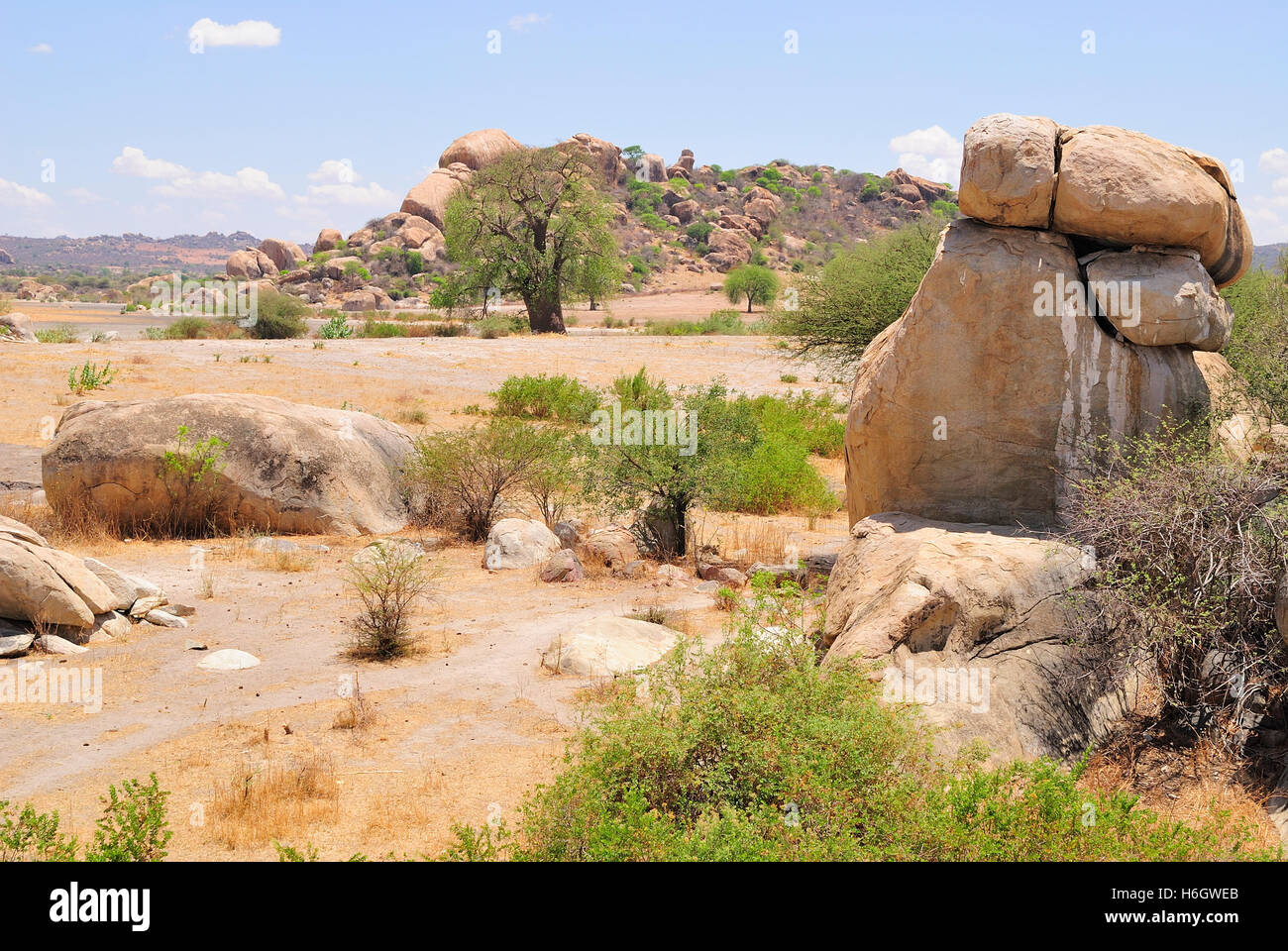 Rock formation around a lake near Nala, Central Tanzania Stock Photo ...