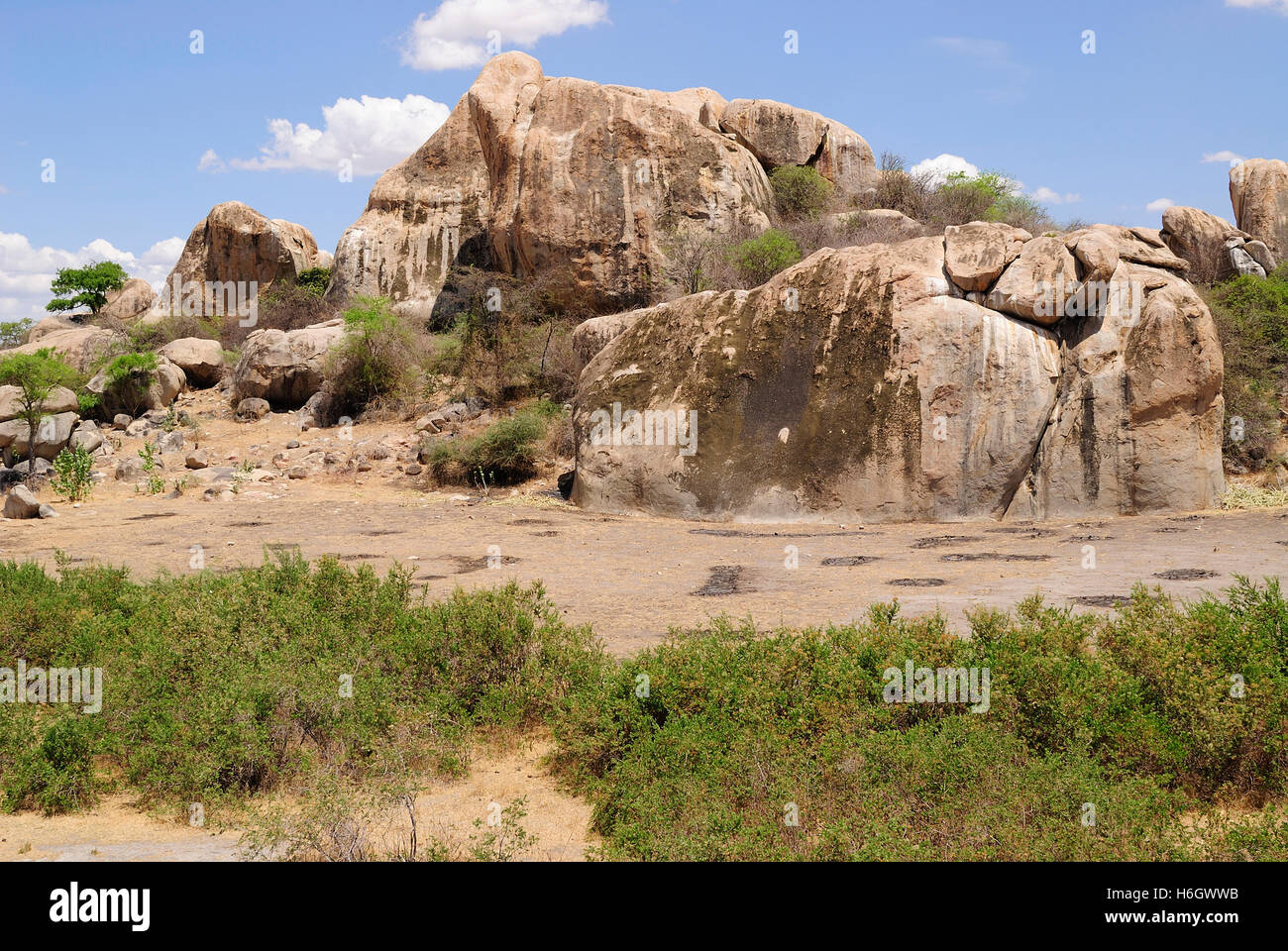 Rock formation around a lake near Nala, Central Tanzania Stock Photo ...