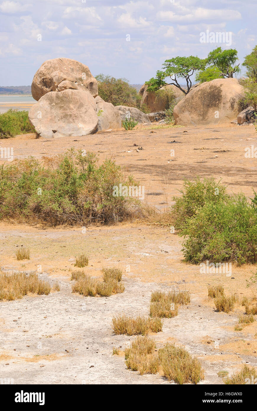 Rock formation around a lake near Nala, Central Tanzania Stock Photo ...