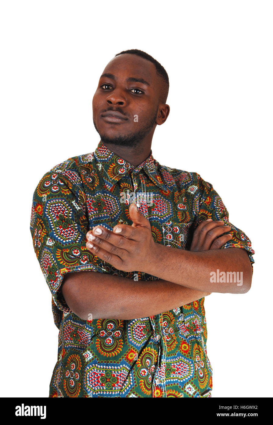 A black young man standing for white background showing with his hand ... A black young man standing for white background showing with his hand ...