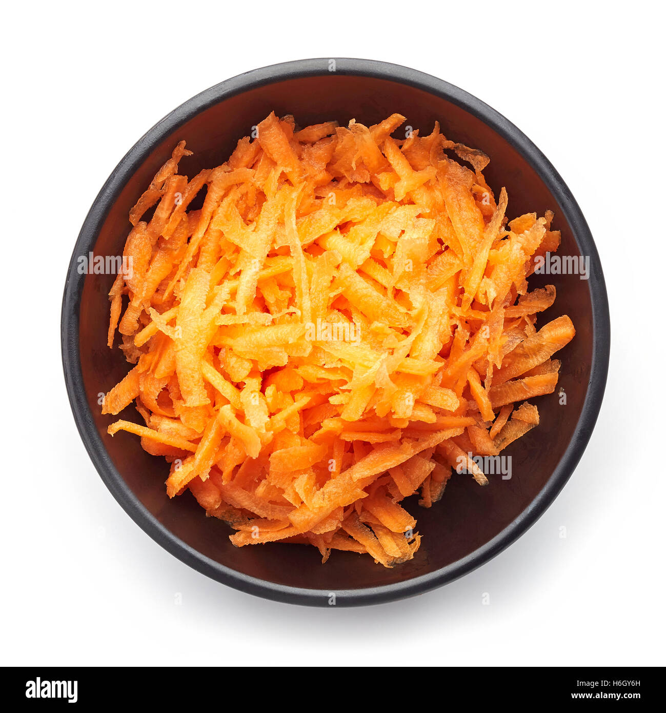 Bowl of grated carrot isolated on white background, top view Stock ...