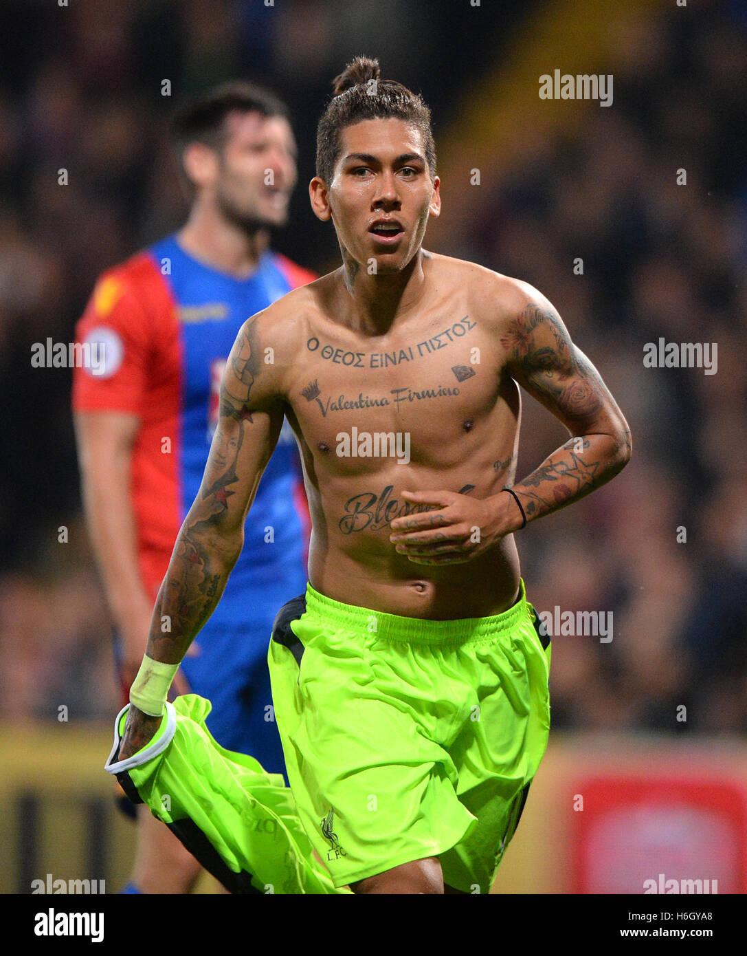 Liverpool's Roberto Firmino celebrates scoring his side's fourth goal ...