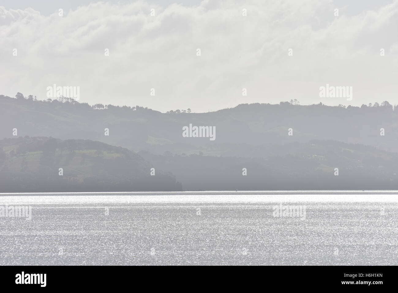 Sea coast in various shades of silver and grey Stock Photo - Alamy