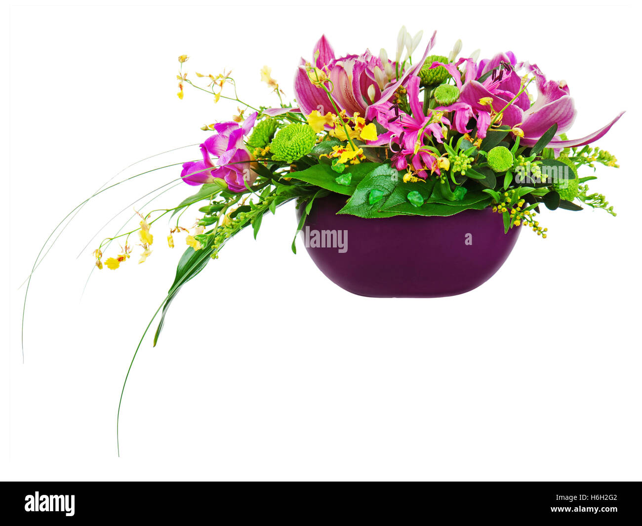 Colorful flower bouquet arrangement centerpiece in vase isolated on ...